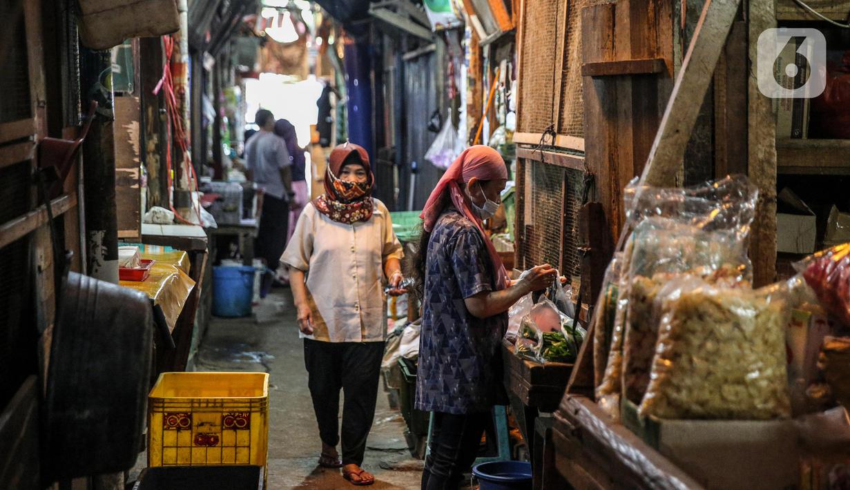 FOTO: Pengunjung Pasar Tradisional Dibatasi 50 Persen - Foto Liputan6.com