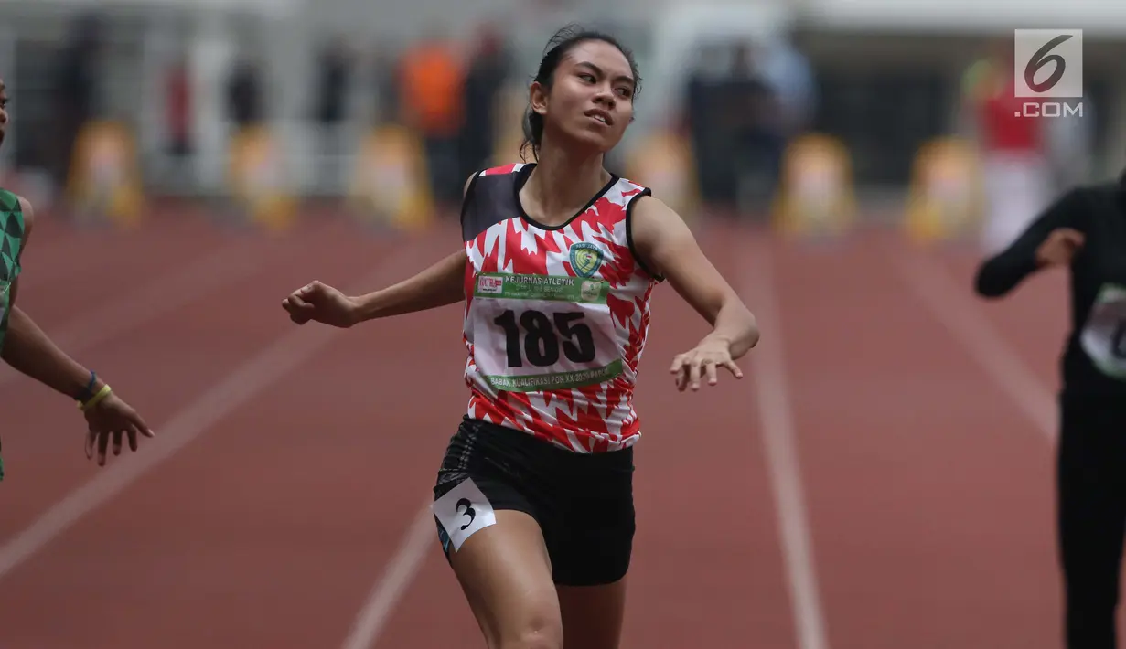 FOTO: Pelari DKI Jakarta Jeany Nurainy Raih Emas 100 Meter Putri U-20 - Foto Liputan6.com