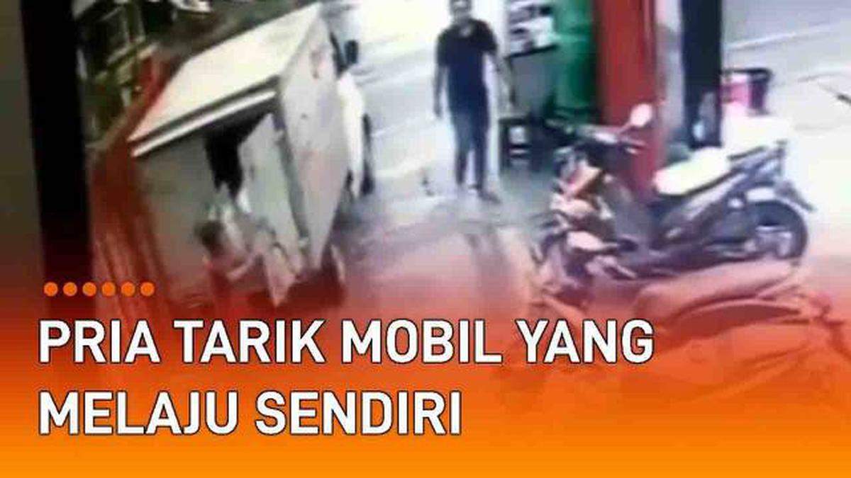 VIDEO: Aksi Heroik Pria Tarik Mobil Boks yang Melaju Sendiri