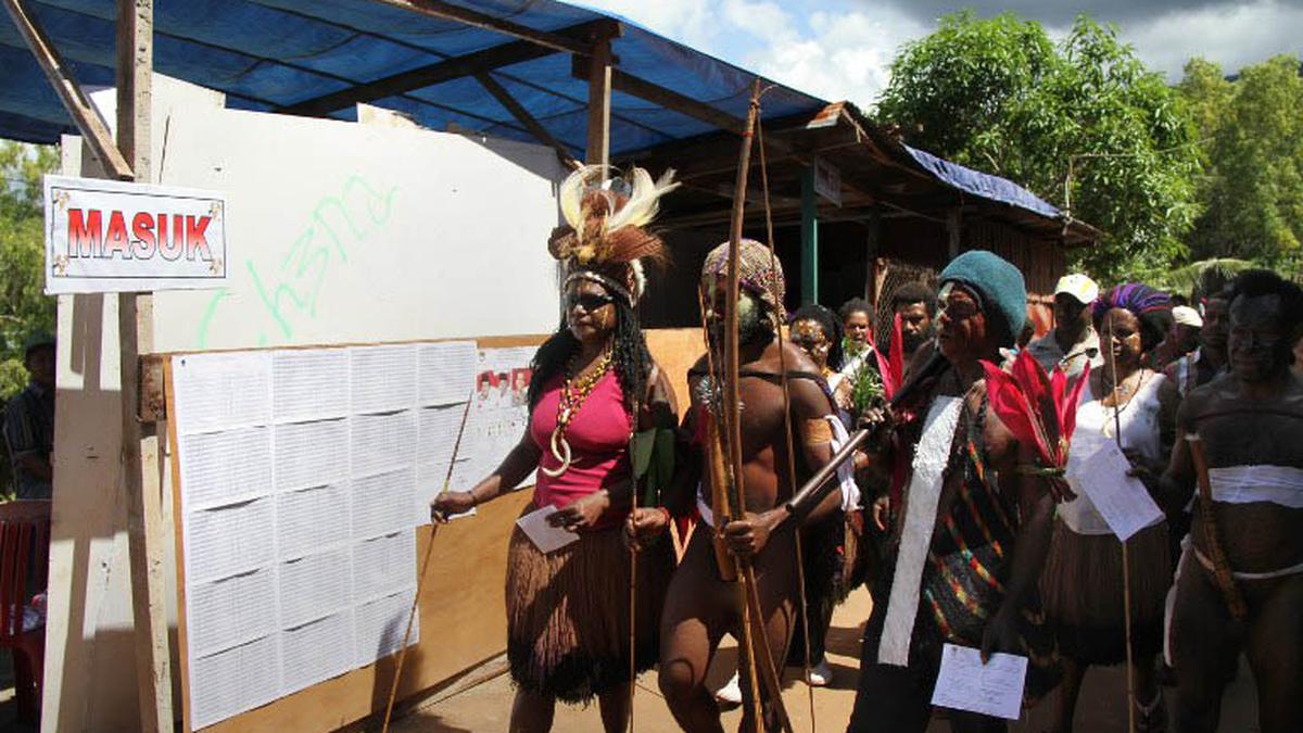 Warga Papua Coblos Pilpres Pakai Koteka - Foto Liputan6.com