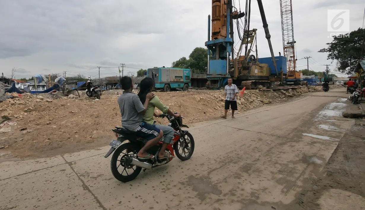 FOTO: Menengok Progres Pembangunan Tanggul Pantai Kamal Muara - Page 1 ...