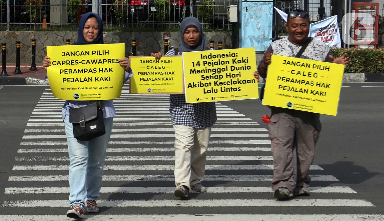 Potret Aktivis saat Peringati Hari Pejalan Kaki Nasional - Foto Liputan6.com