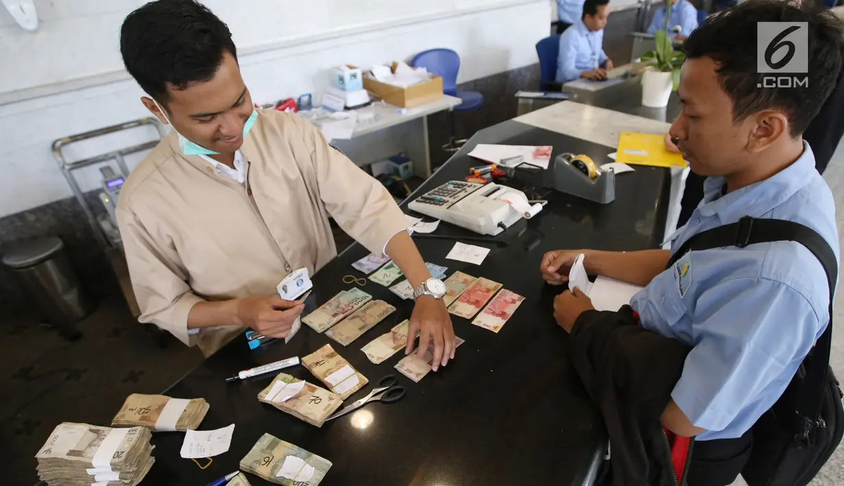 FOTO: Tukar Uang Rusak di Bank Indonesia Gratis, Ini Syaratnya - Foto ...