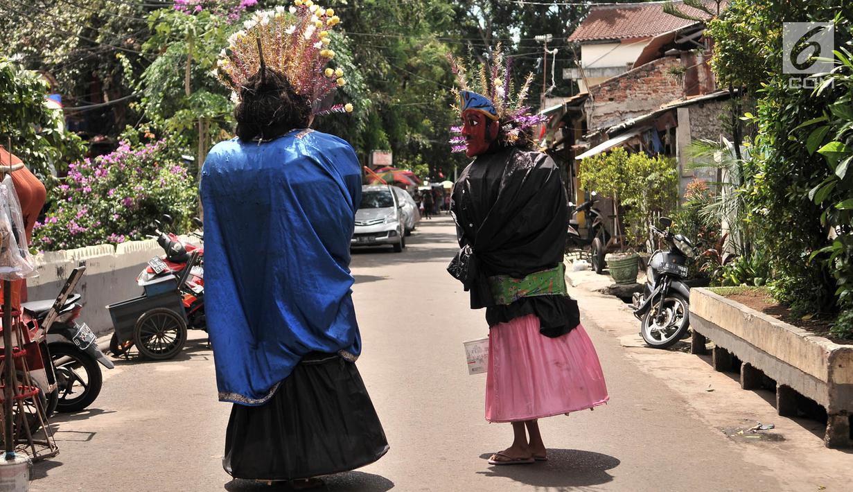 FOTO: Pemprov DKI Akan Tertibkan Pengamen Ondel-Ondel - Foto Liputan6.com