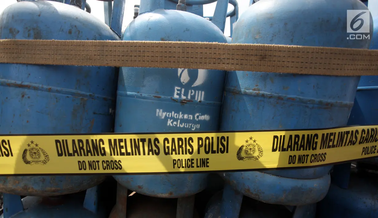 FOTO: Ribuan Tabung Gas Oplosan Ditemukan di Tangerang - Foto Liputan6.com