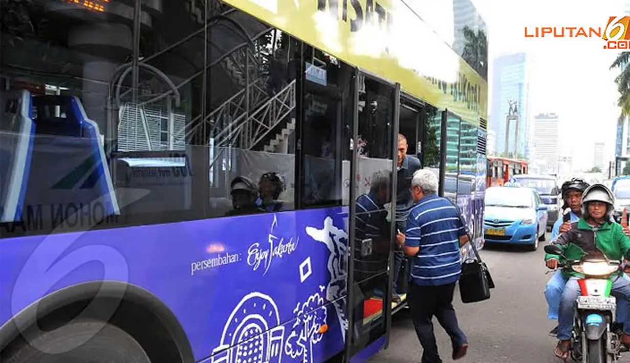 [FOTO] Bus Pariwisata Jakarta Mulai Beroperasi - Foto Liputan6.com