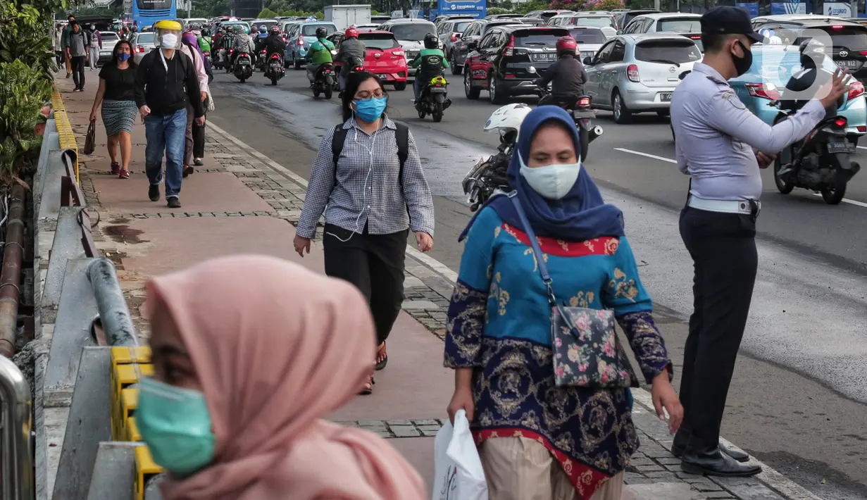 FOTO: Suasana Jam Pulang Kantor Pekerja di Jakarta - Foto Liputan6.com