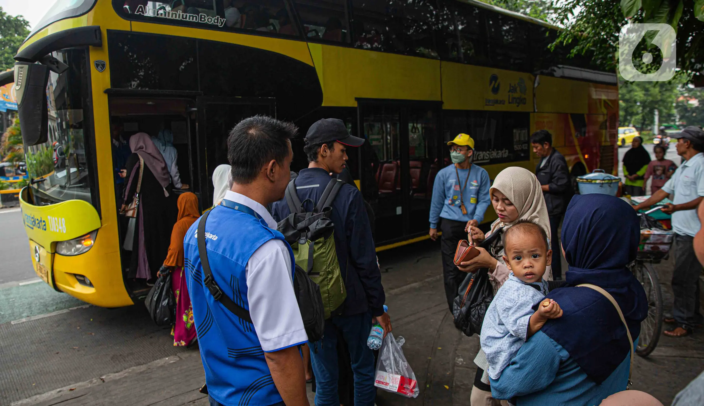 Menikmati Libur Akhir Tahun dengan Bus Wisata Transjakarta - Foto Liputan6.com