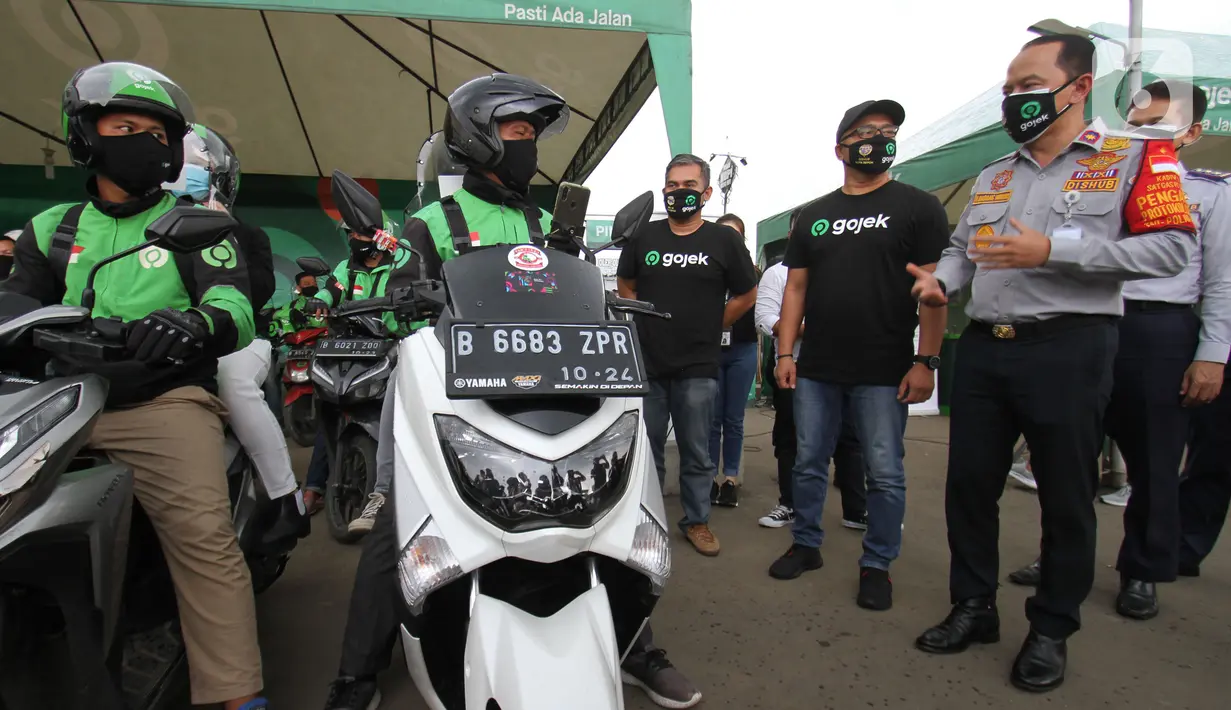 FOTO: Zona Nyaman J3K Gojek Buka Layanan Penitipan Helm Pribadi - Foto Liputan6.com