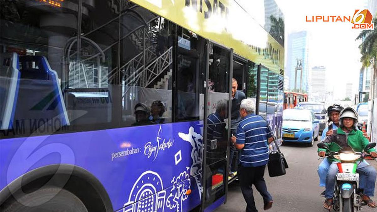 [FOTO] Bus Pariwisata Jakarta Mulai Beroperasi - Foto Liputan6.com