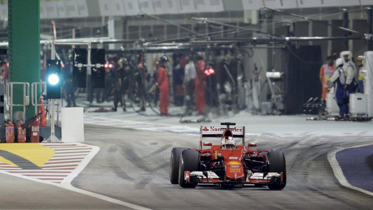 Vettel Kampiun di GP Singapura, Hamilton Gagal Finis - Ragam Bola.com