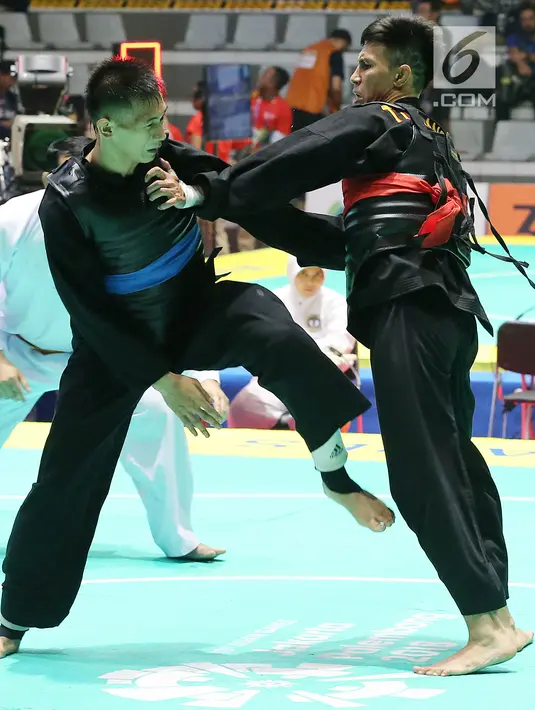 FOTO : Pesilat Indonesia, Iqbal Candra Pratama Masuk ke 8 Besar Asian Games 2018 - Foto Liputan6.com