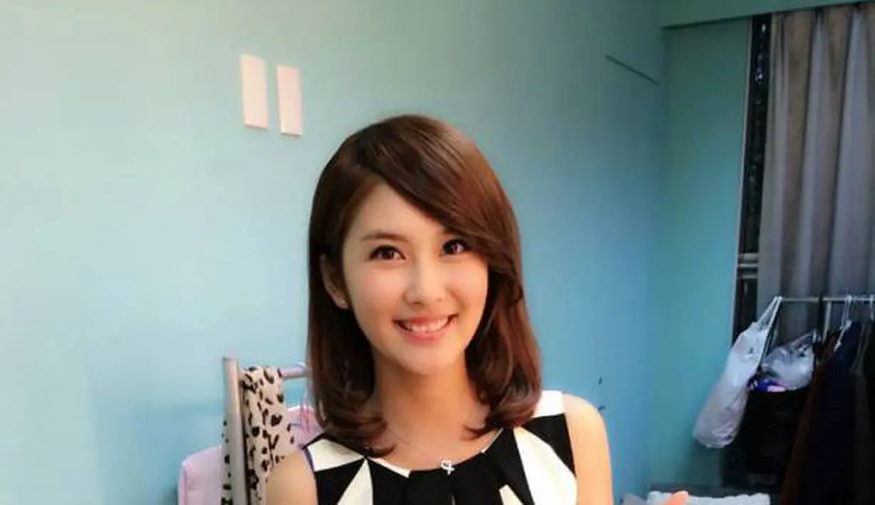 Junze Zhuo: Pembawa Berita Cantik Yang Mencuri Perhatian di Dunia Maya - Photo Fimela.com