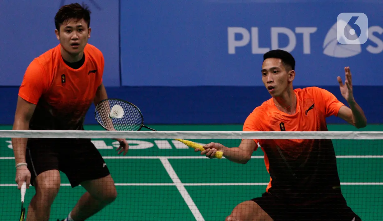 FOTO: Hajar Malaysia, Tim Bulutangkis Beregu Putra Raih Medali Emas SEA Games - Foto Liputan6.com